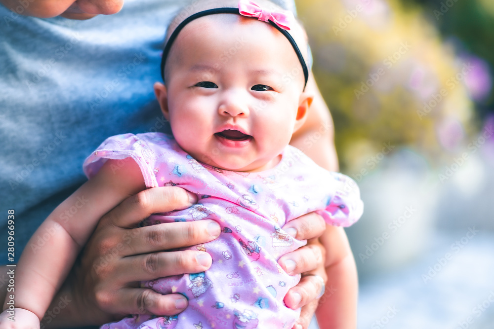 Asian baby happy in the graden.Asian baby girl happy family time. Stock ...