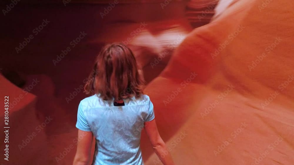 Young woman in Antelope Canyon in Arizona. Tourist in Antelope Canyon ...