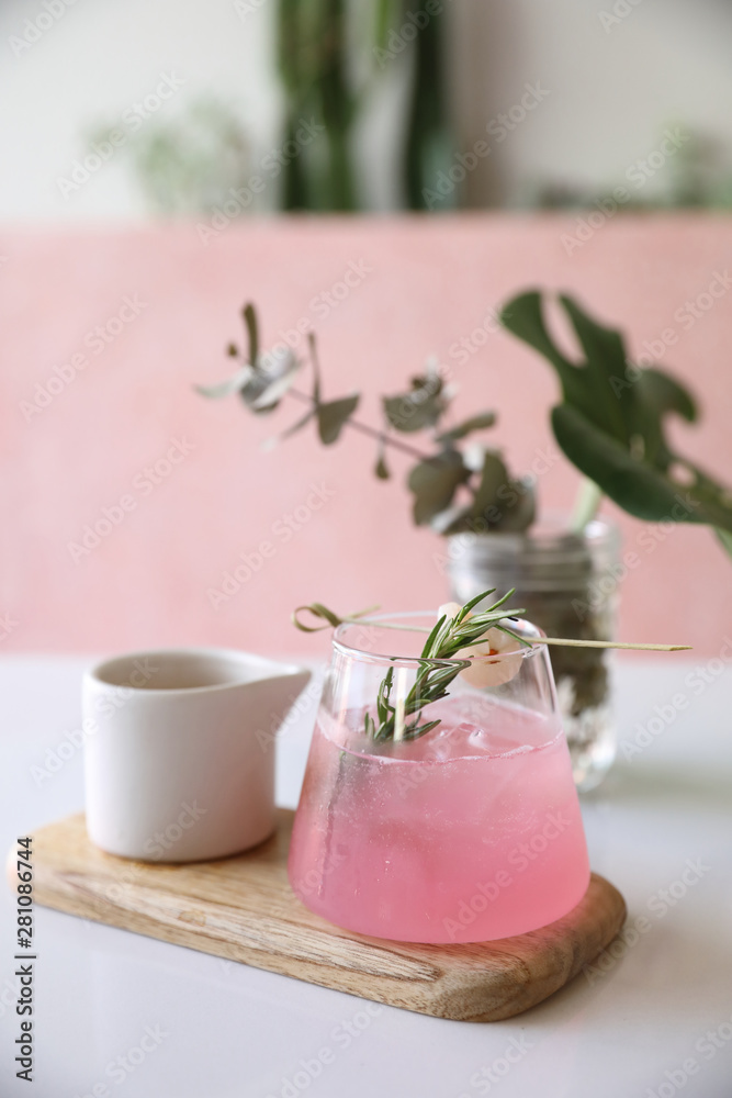 Pink cocktail with rosemary and lychee in pink background Stock Photo ...