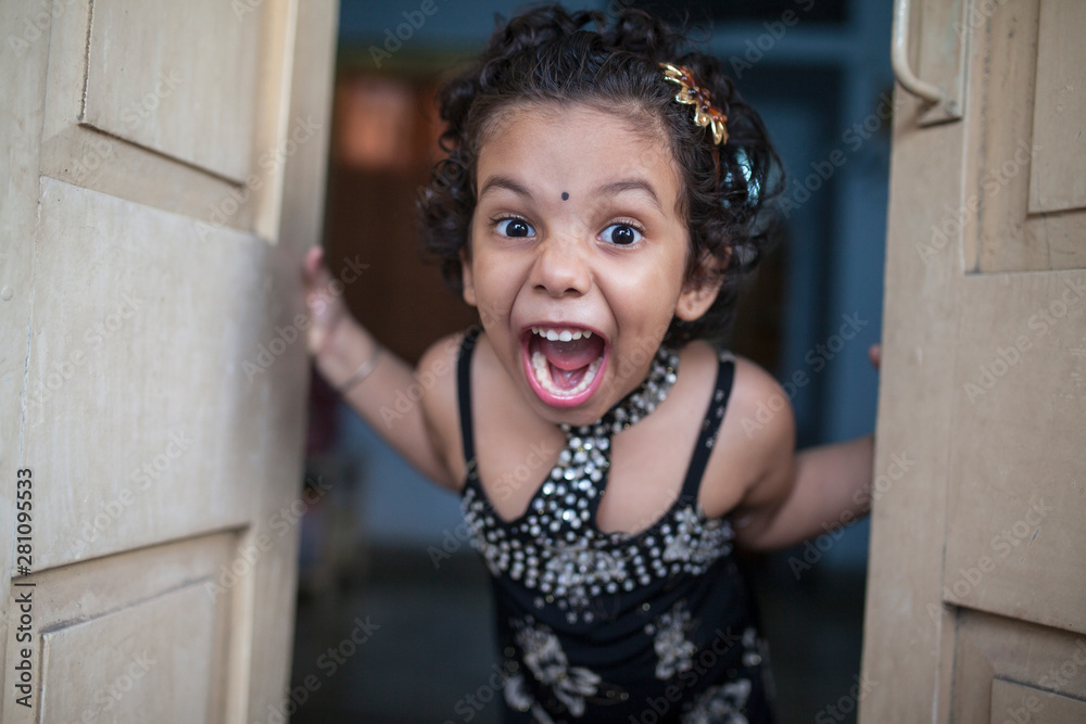 Little girl screaming and making fun Stock Photo | Adobe Stock