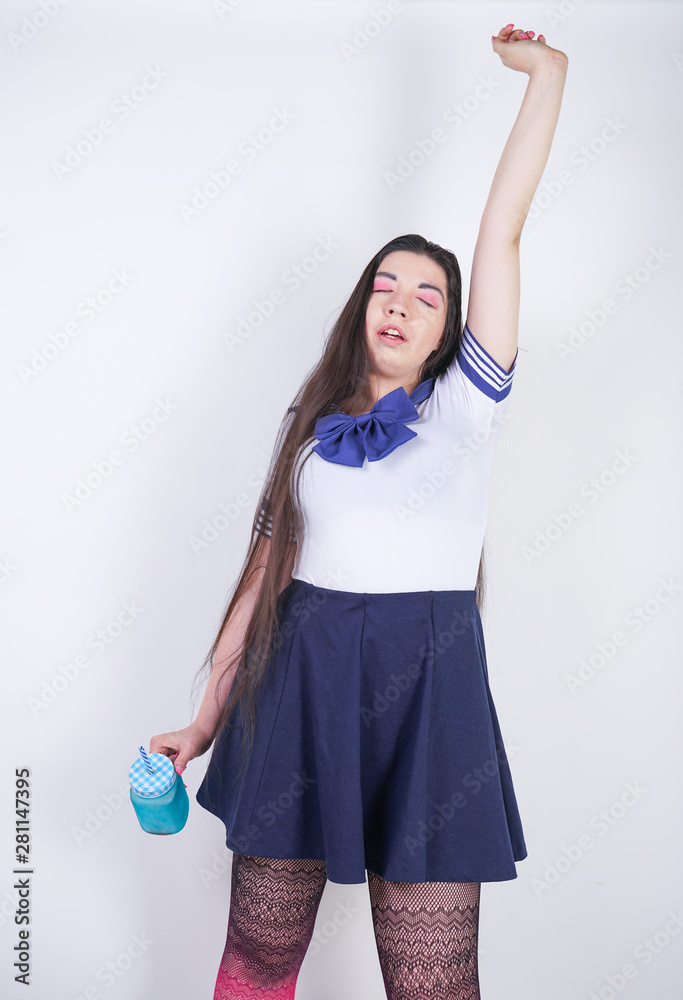 tired girl in anime school uniform yawns and wants to sleep Stock Photo ...