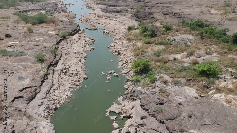 Aerial drone footage of a river with potholes - At Nighoj near Pune and ...