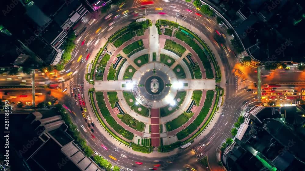 4K Time lapse, aerial top view traffic road roundabout in city at night ...