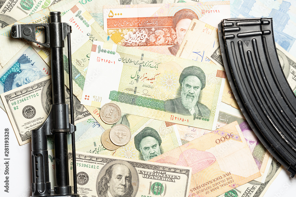 Foto de Soviet automaton AK 47 against the backdrop of Iranian money ...