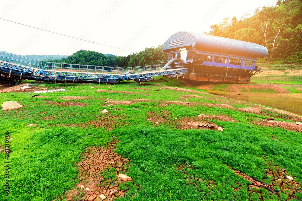 Crisis of water shortage in big dam ..Floating pump laying on the ...