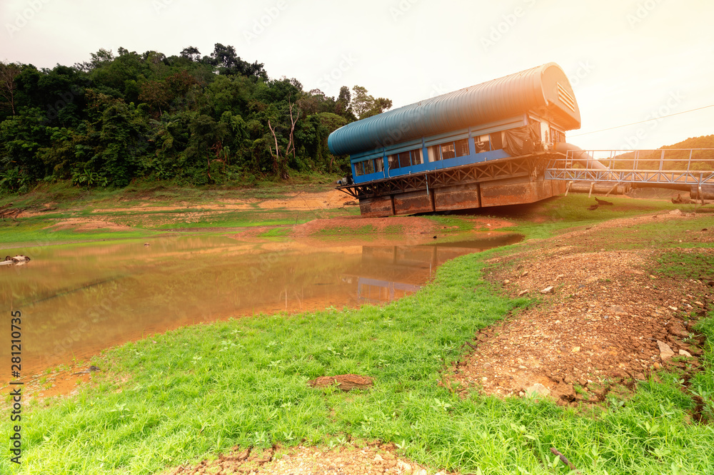 Crisis of water shortage in big dam ..Floating pump laying on the ...