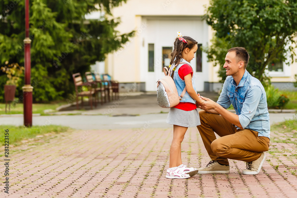 Father Dropping Off Daughter In Front Of School Gates Stock Photo ...