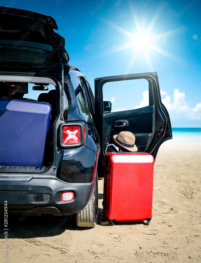 Black summer car on beautiful sunny beach. Summer journey and stopover ...