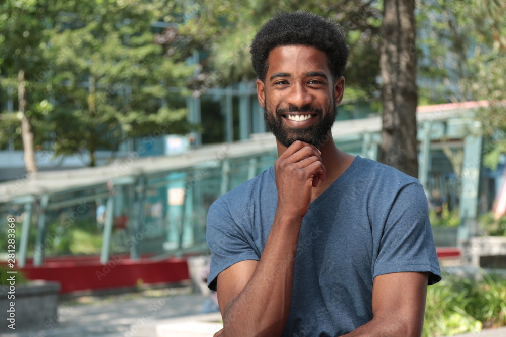 Beautiful black man outside Stock Photo | Adobe Stock