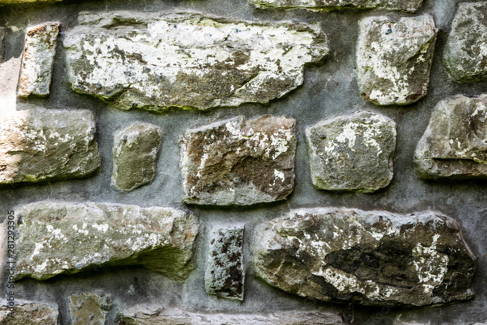 texture of masonry, a fragment of a stone wall of an ancient temple of ...