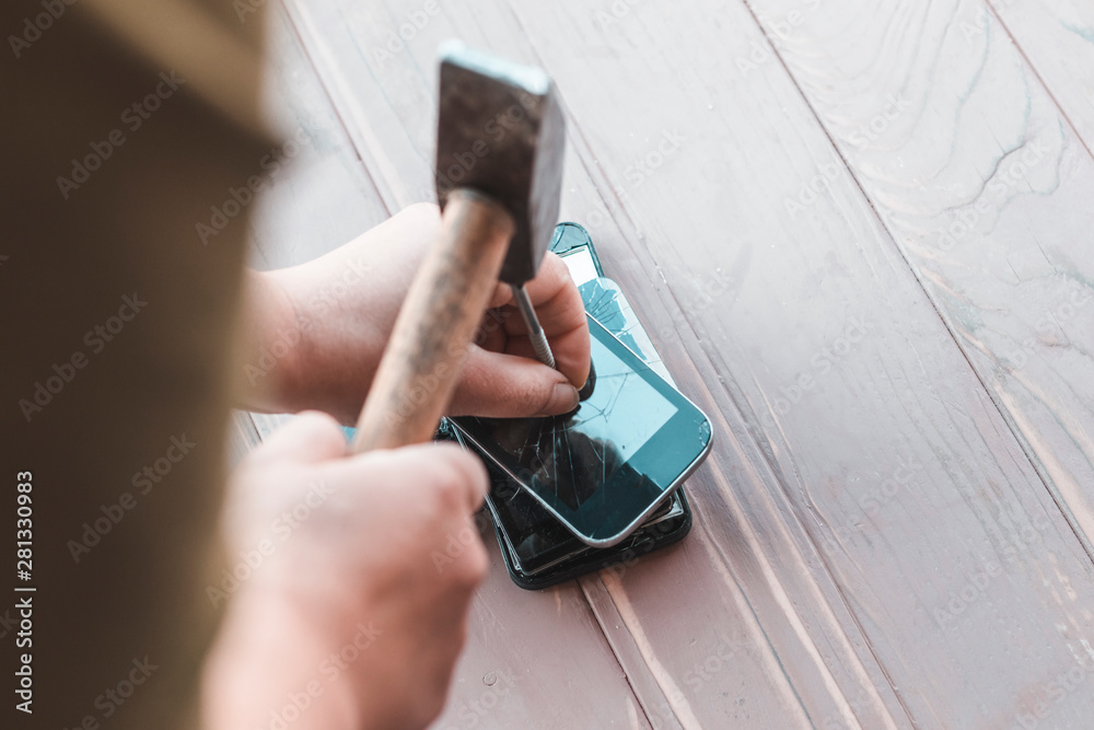 daylight. hammer hit on the phones. in one of them there is a metal ...