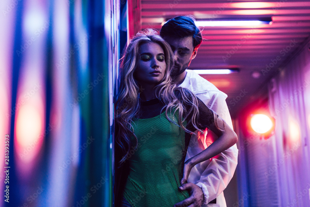 Blonde Woman Hugging Man