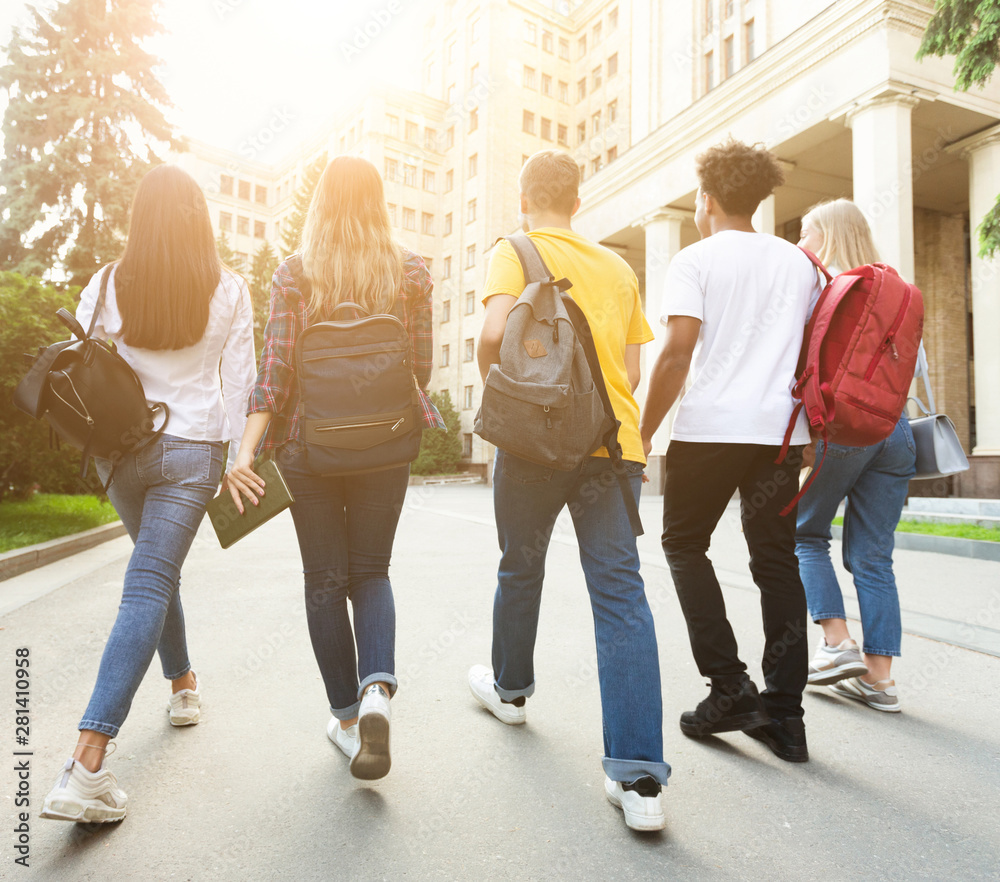 College students walking together outdoors after studies Stock Photo ... College students walking together outdoors after studies Stock Photo ...