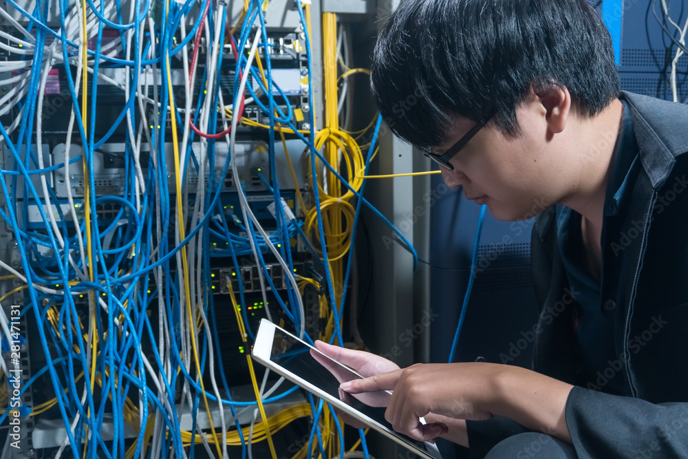 Engineer with toolboxs come to server room for work,check problem of ...