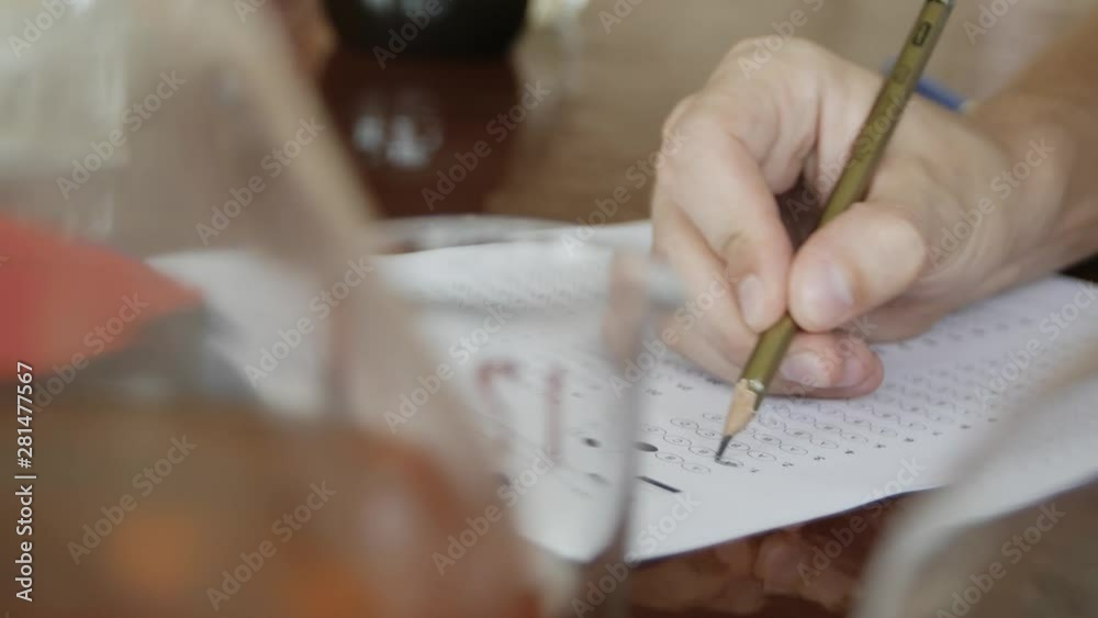 Education students testing exam with pencil drawing selected multiple ...
