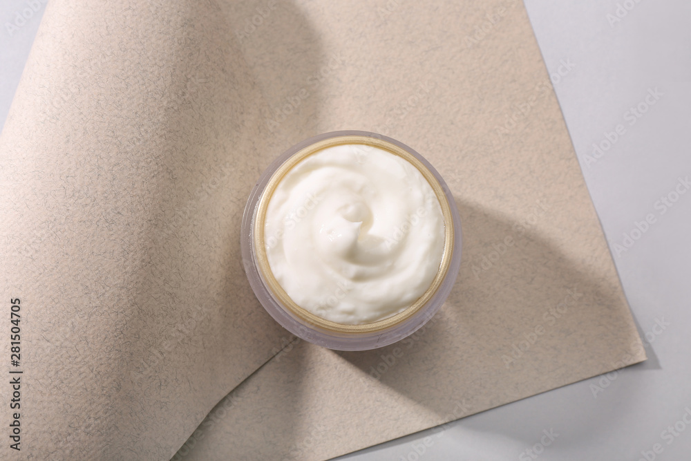 Jar of natural cream on light background Stock Photo | Adobe Stock
