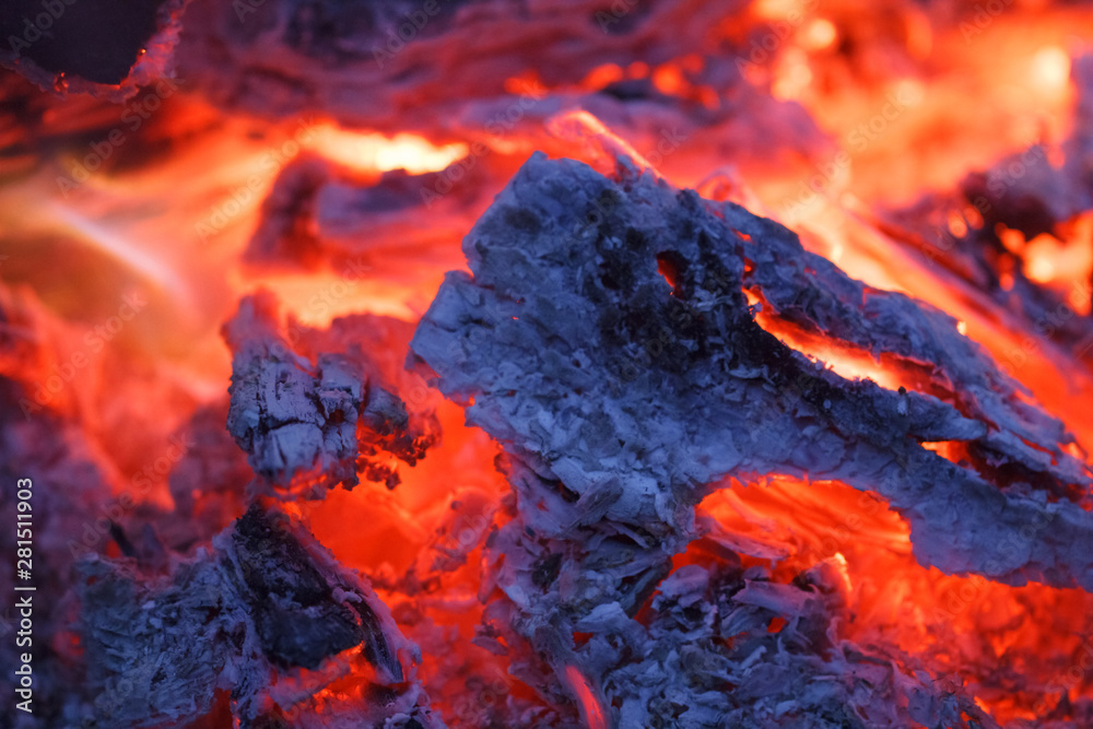 Abstract background of burning coals. Smoldering embers of fire at ...