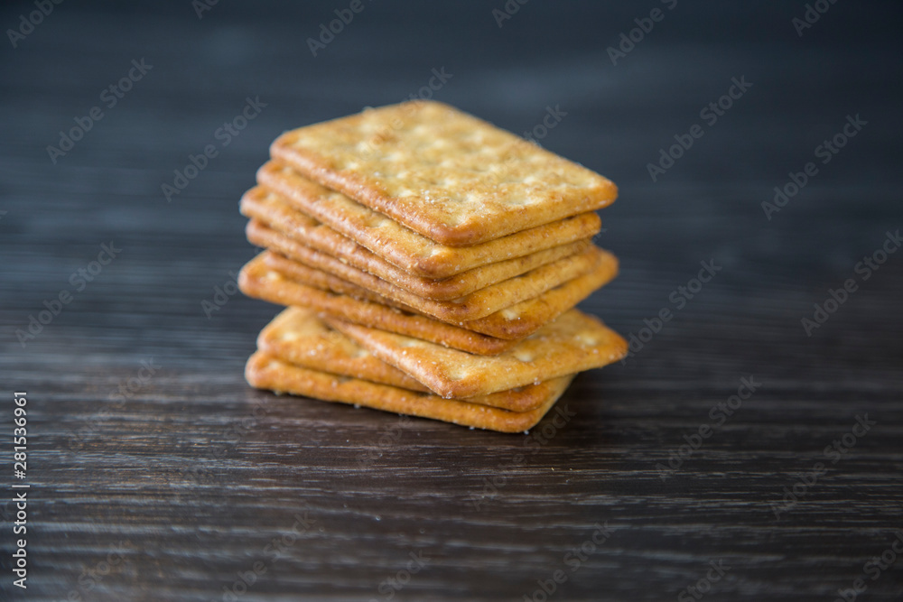 Tower of crackers waiting to be eaten with cheese and crackers as part ...