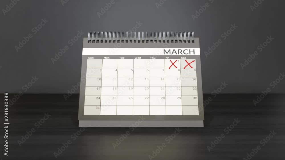 Flagged days in monthly calendar on desk year calendar. Counting down ...