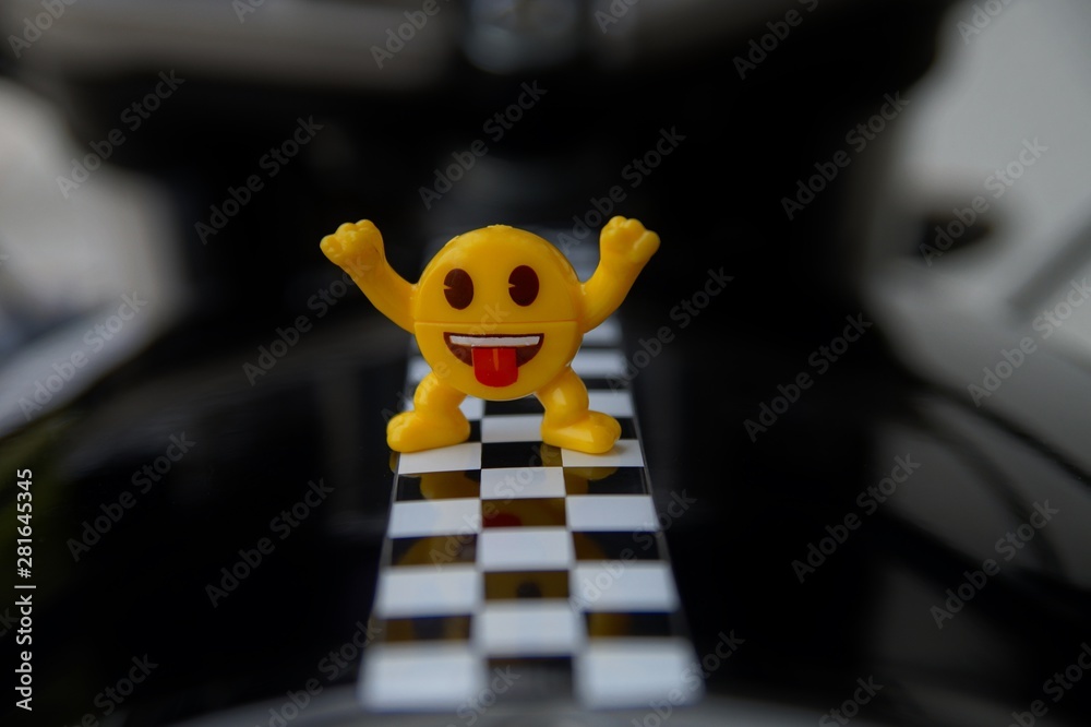 Little yellow smiley man is on motorcycle. winner emoticon smiley ...