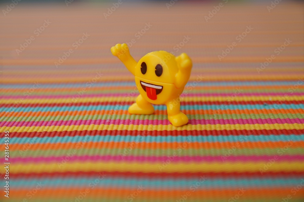 Little yellow smiley man is on colored lines. winner emoticon smiley ...