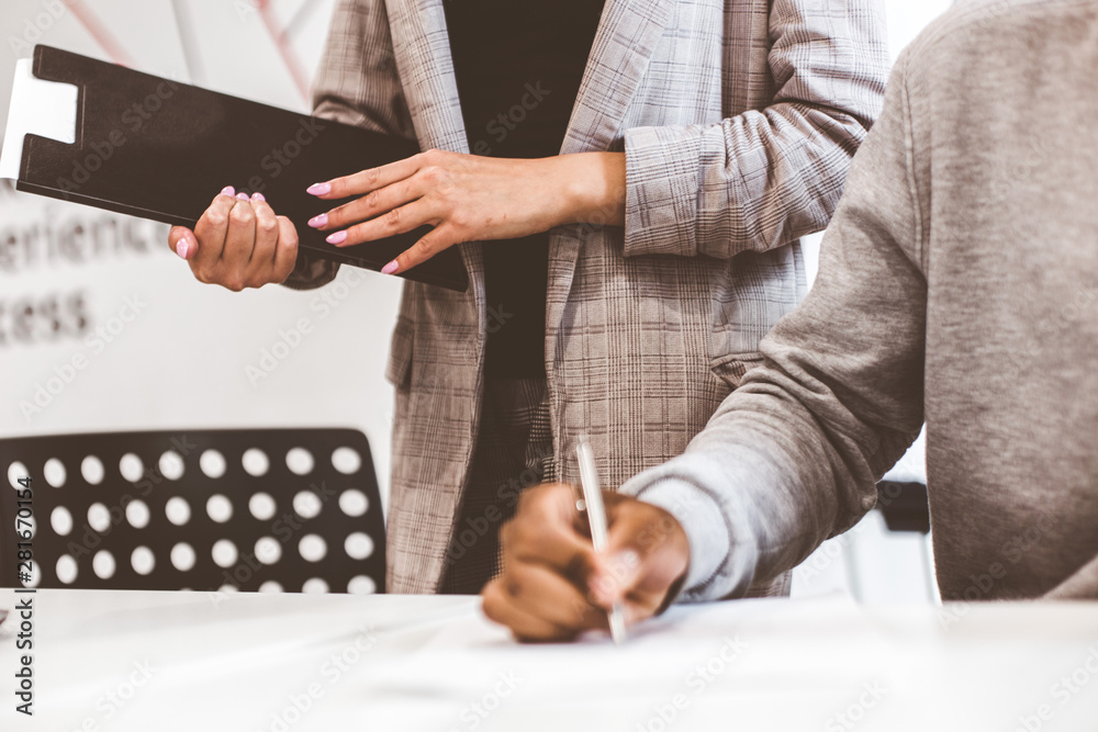 African american man signing contract, black man hand putting signature ...