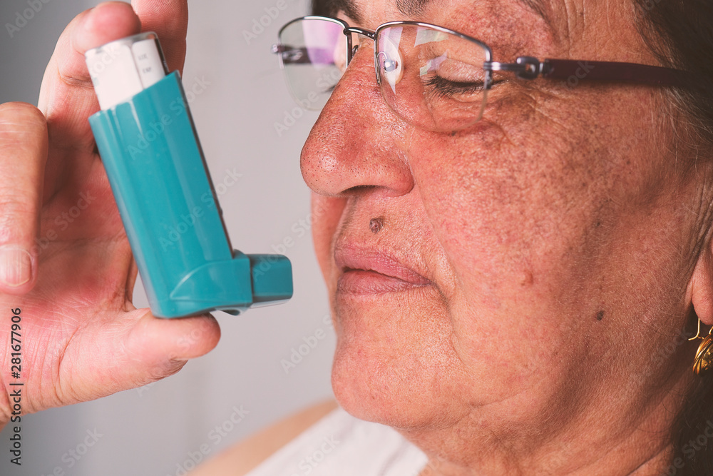 Old woman using asthma inhaler. Asthma Treatment, Elderly Person Stock ...