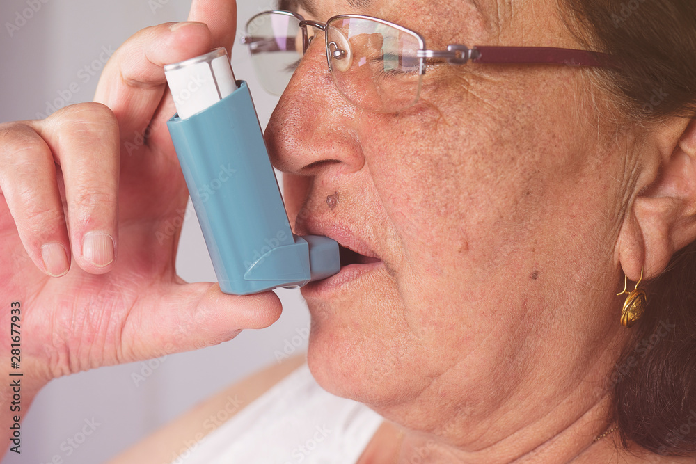 Old woman using asthma inhaler. Asthma Treatment, Elderly Person Stock ...