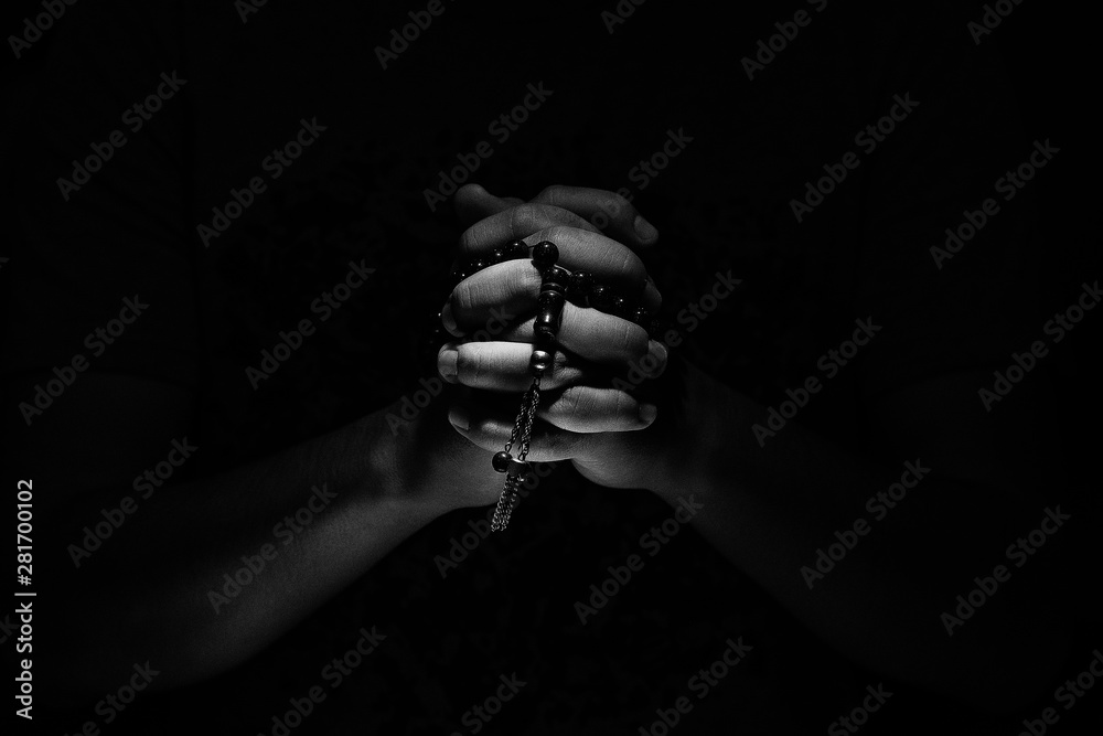 Manos orando Stock Photo | Adobe Stock