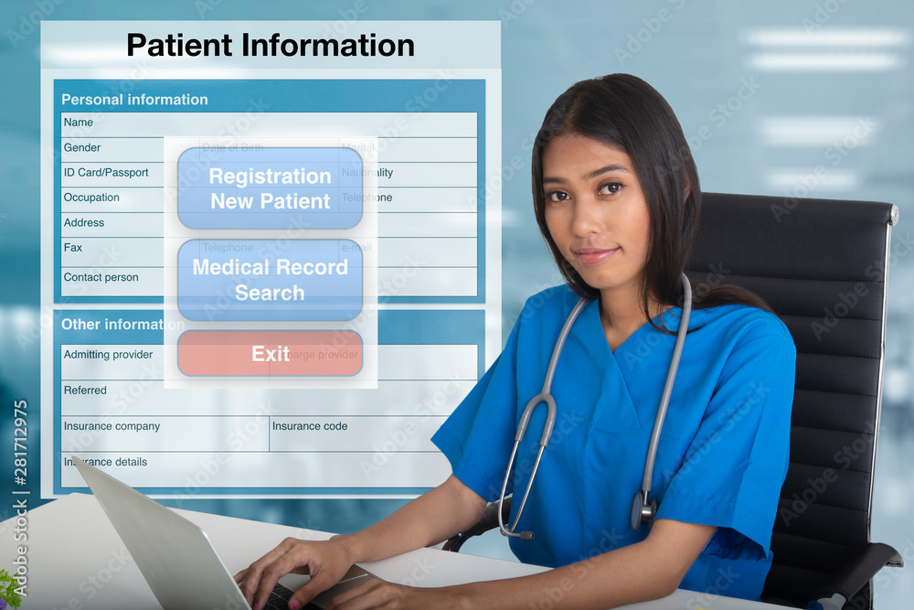 Female doctor working on notebook computer with medical record and ...