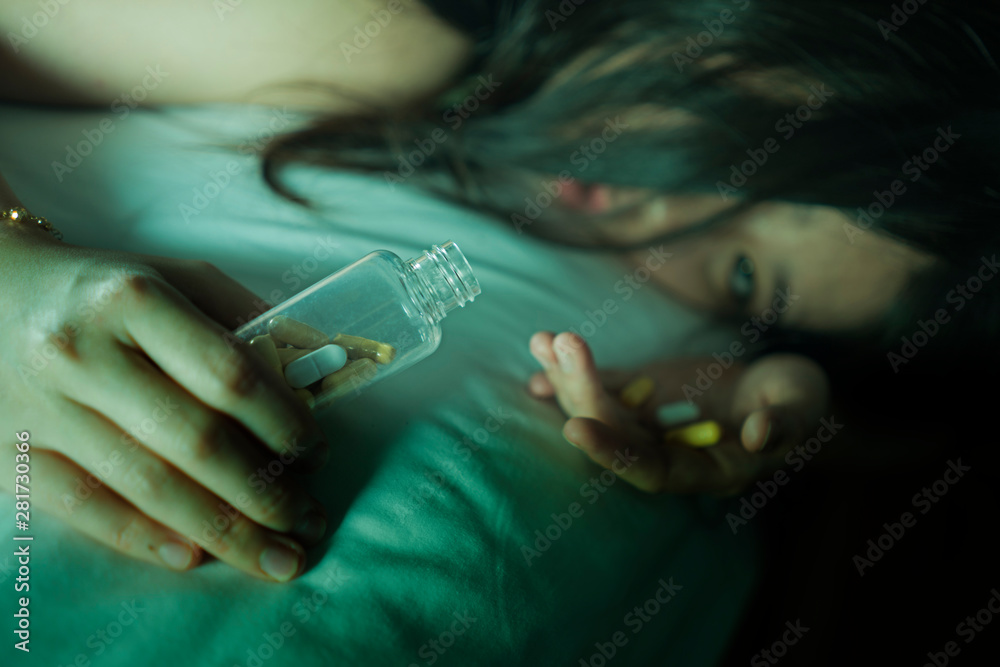 young beautiful desperate and wasted addict Asian Japanese woman taking ...