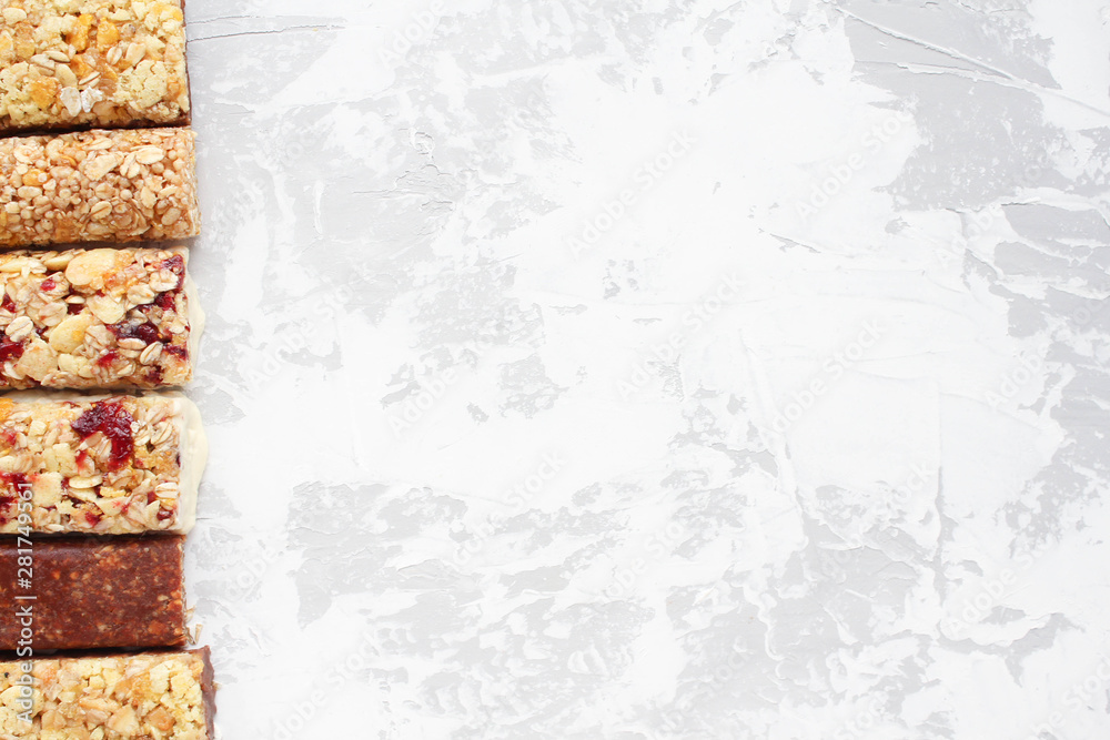 Granola bar on gray cement background. Healthy organic sweet dessert ...