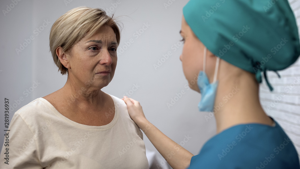 Female nurse telling patient bad diagnosis, disappointing news, woman ...