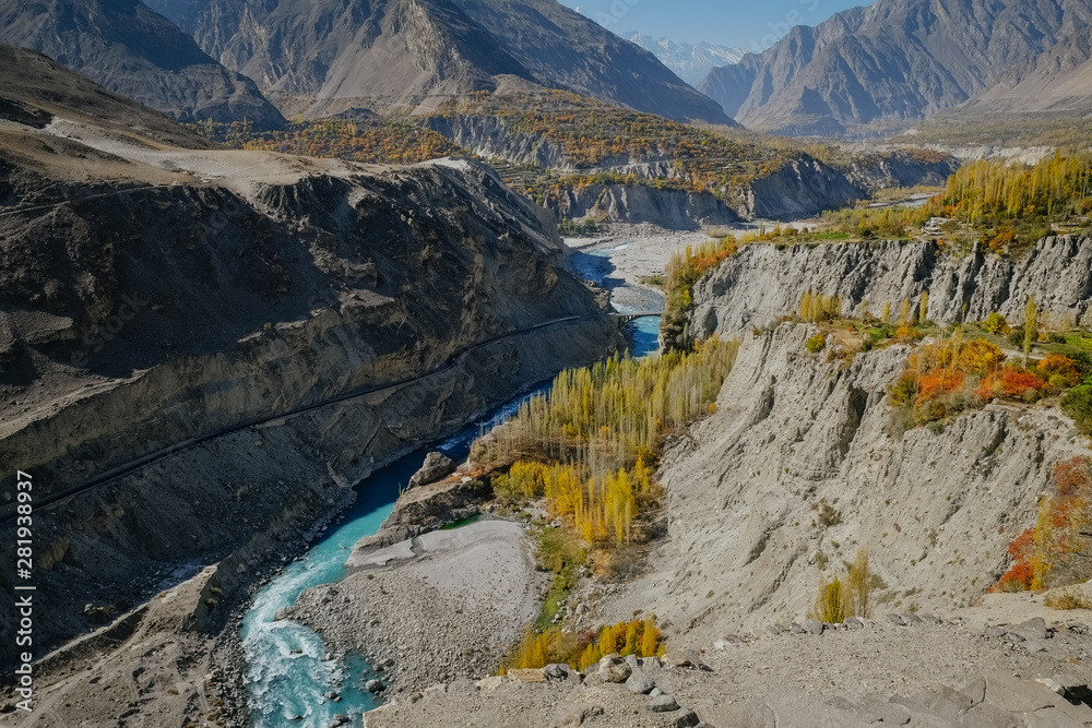 Winding turquoise blue water river flowing through Hunza Nagar valley ...