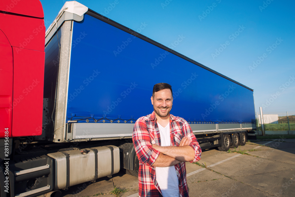 Truck driver occupation. Portrait of middle aged caucasian trucker with ...