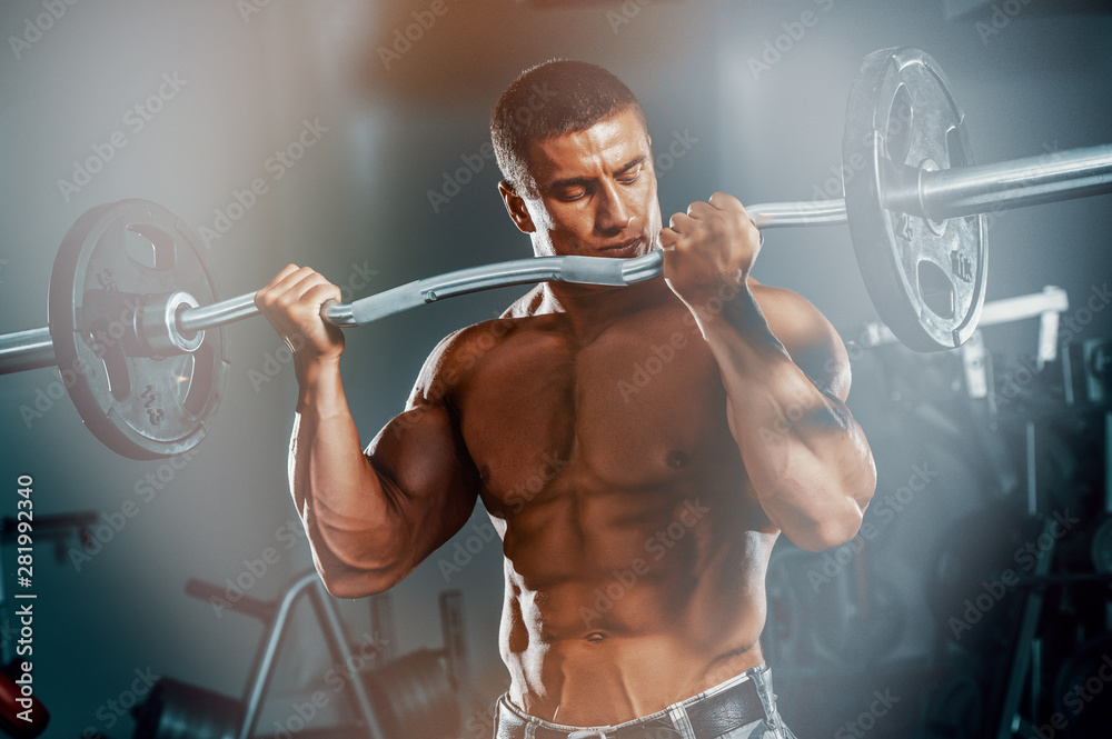 Bodybuilder Exercise With Weights at the Gym Stock Photo | Adobe Stock