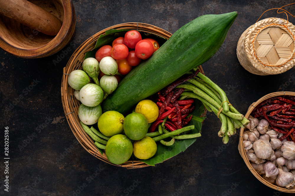 Som tum , papaya salad ingredients on dark background table, top view ...