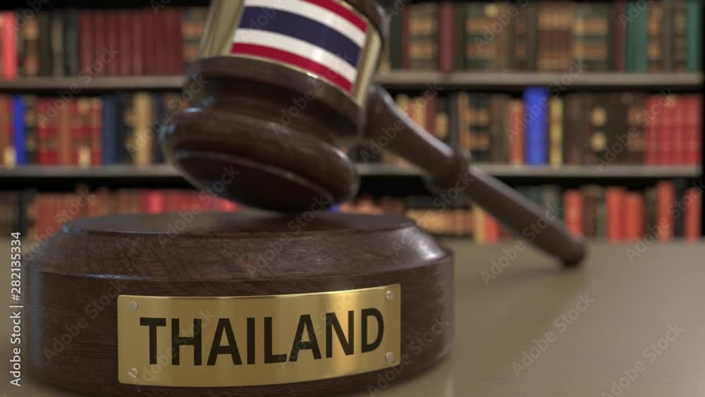Flag of Thailand on falling judges gavel in court. National justice or ...
