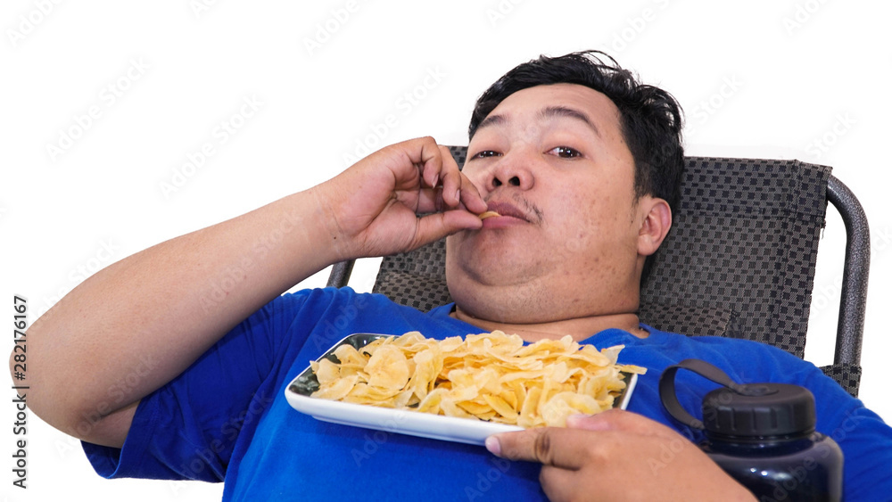 Portrait of lazy Overweight man eating chips and holding water ... Portrait of lazy Overweight man eating chips and holding water ...