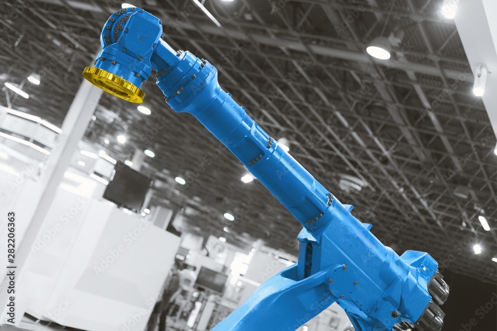 Automatic robot arm working in industrial environment Stock Photo ...