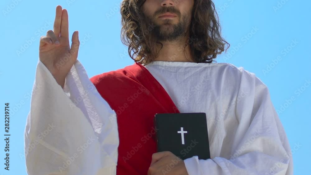 Vidéo Stock Jesus showing benediction sign, holding Bible, Papal ...