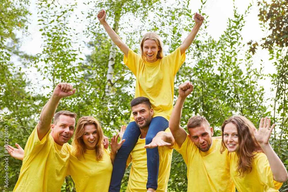Cheering winner team with wife in piggyback Stock Photo | Adobe Stock