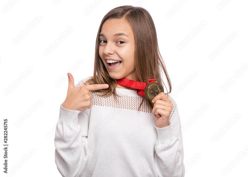 Happy winner. Portrait of beautiful Teen Girl Student with gold Medal ...