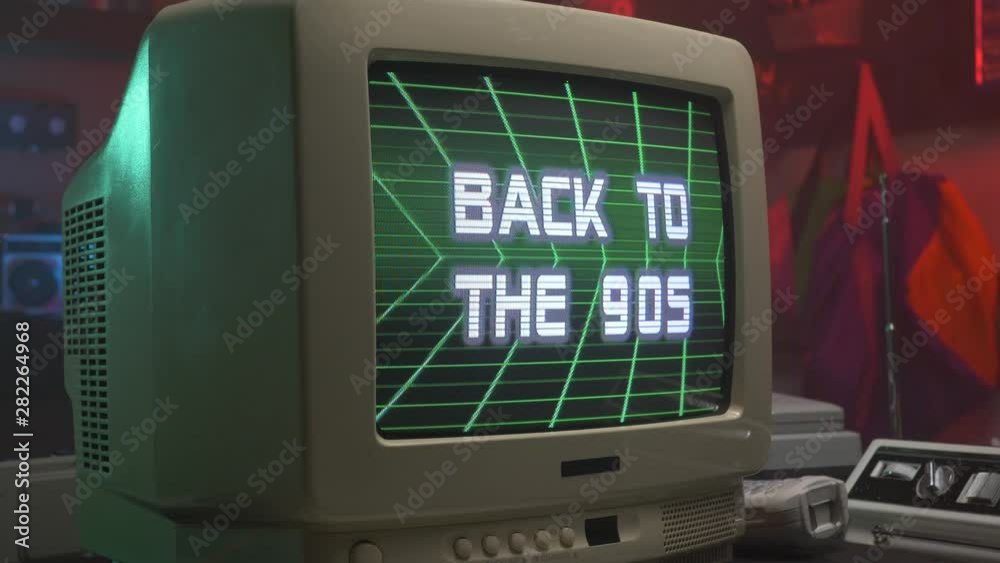 BACK TO THE 90S title appearing on Old Computer - TV Screen vídeo de ...