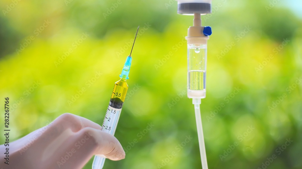 Chemotherapy drug medical holding hypodermic syringe needle injection ...