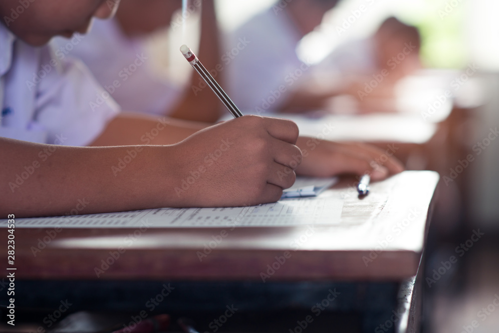 Exam with uniform school student doing educational test with stress in ...