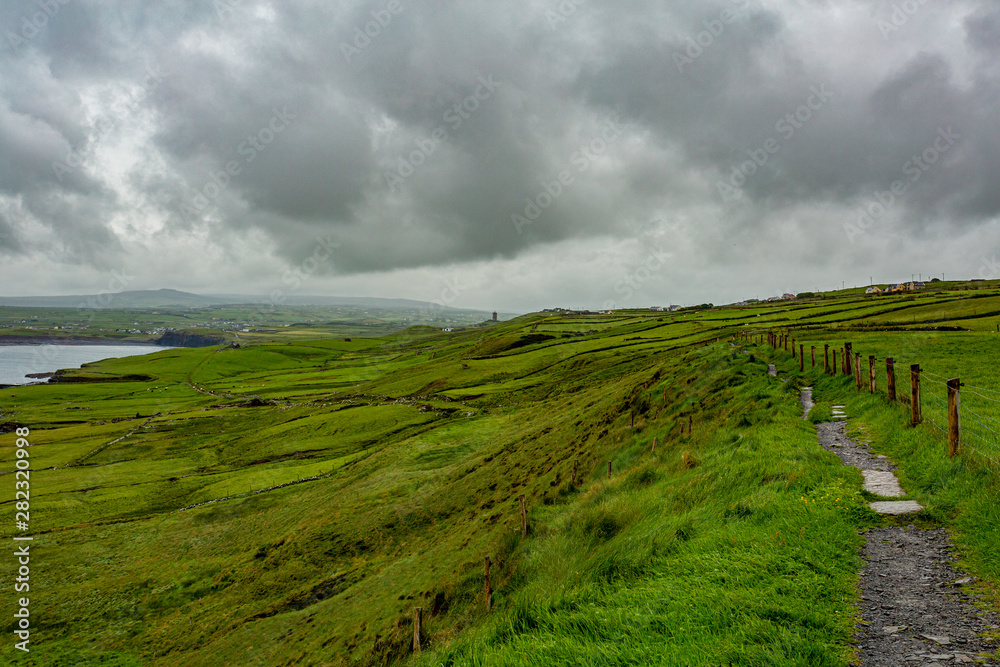 Irish countryside with a rural trail in of the coastal route walk from ...