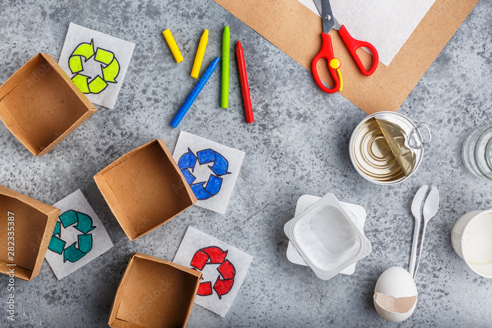 Kids hands is making recycling game kid is drawing recycle sign paper ...