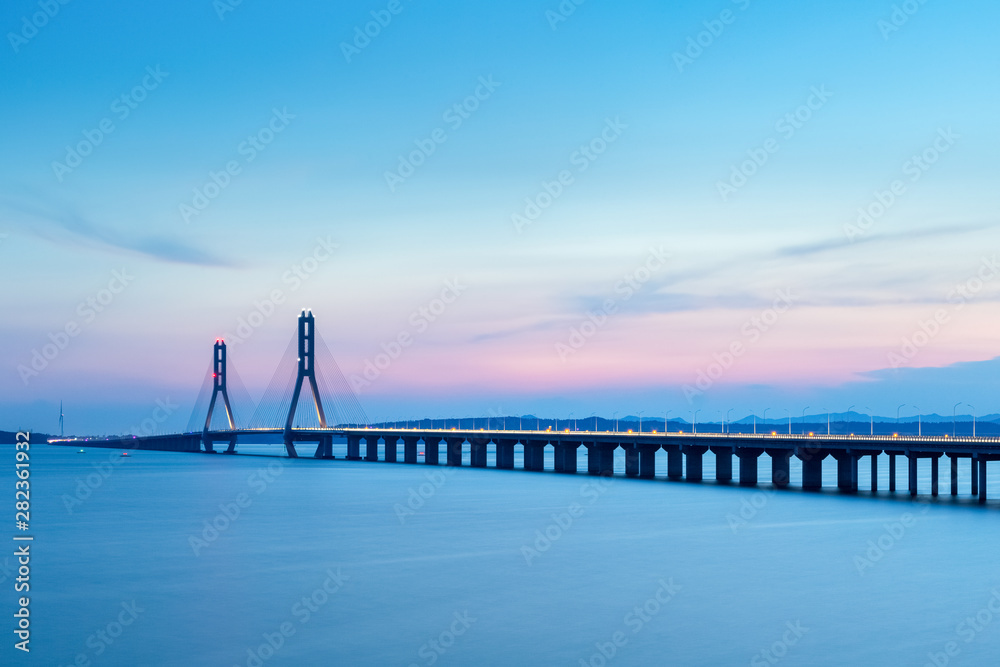 poyang lake cable-stayed bridge in sunset Stock Photo | Adobe Stock