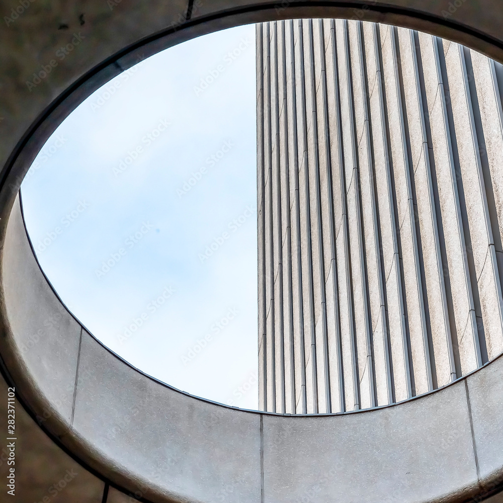 Square Close up view from the inside of the round skylight of a ...